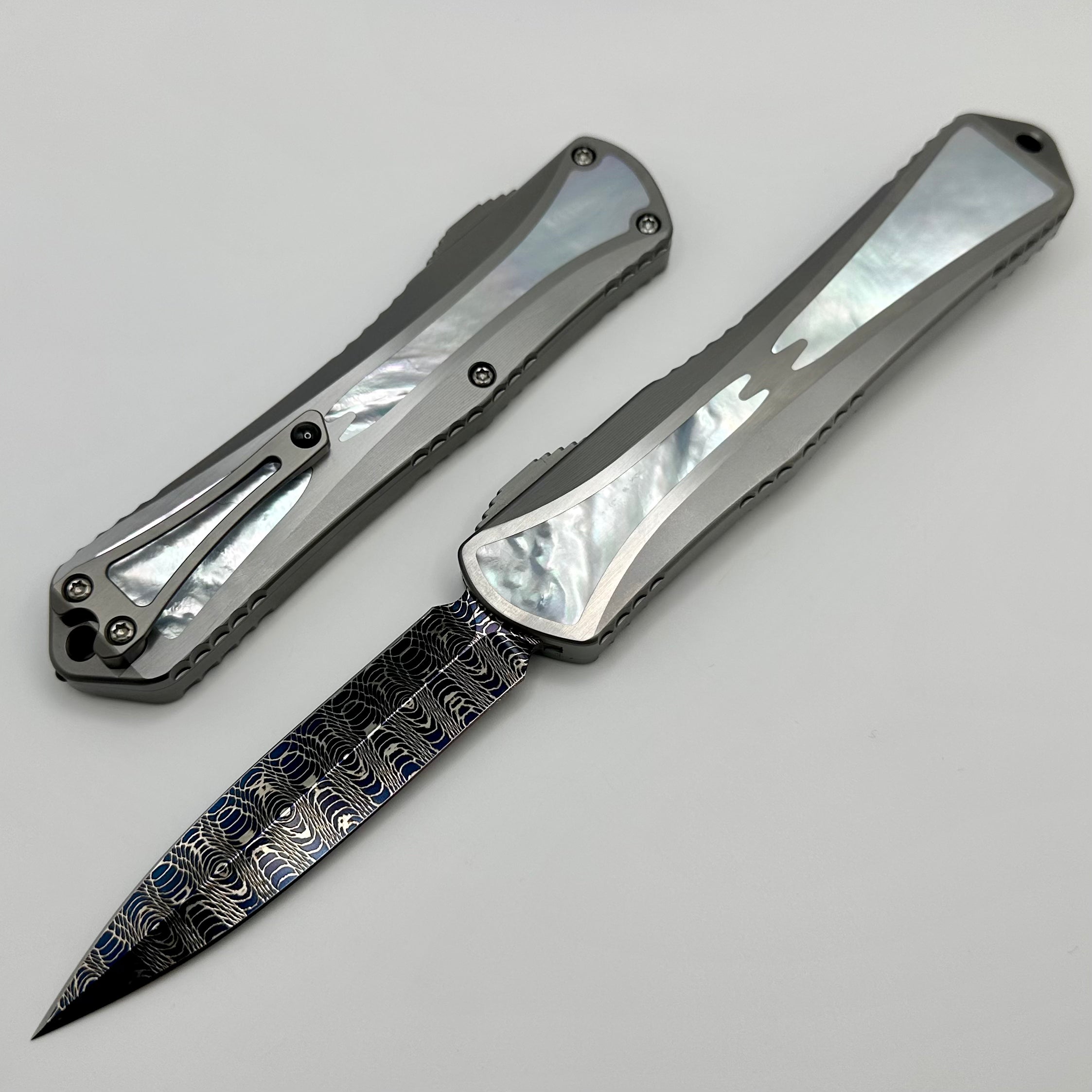 Heretic Knives Manticore X Hand Ground Vegas Forge Blued Damascus D/E