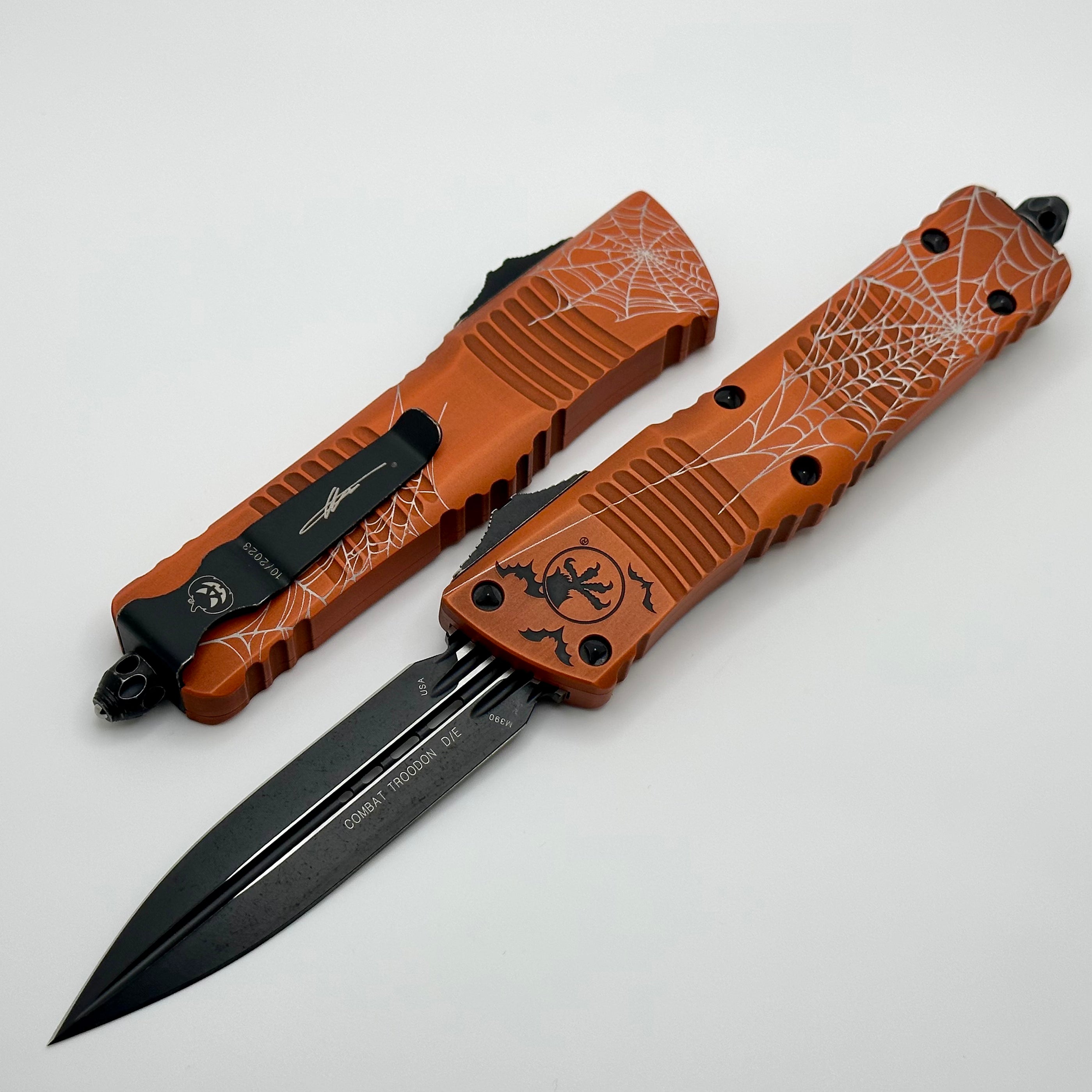 Microtech Combat Troodon D/E Halloween Web Orange Fluted Standard 23’