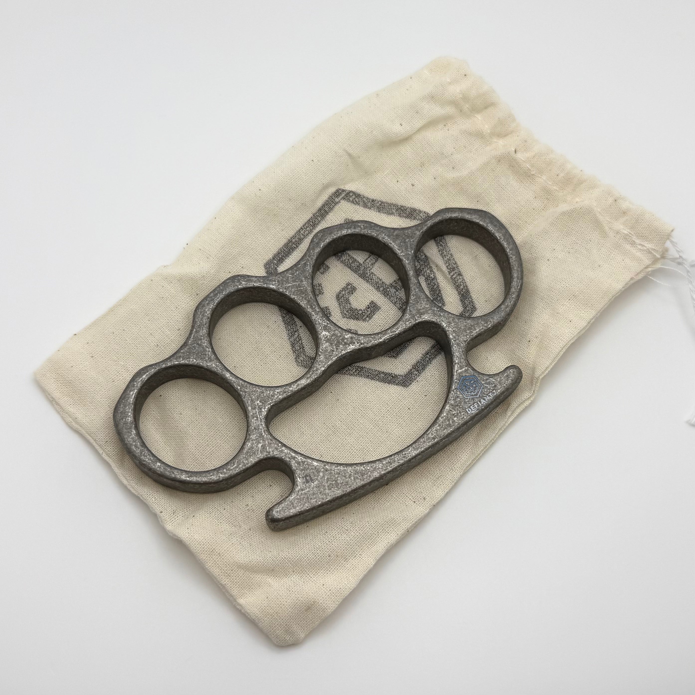 Defiant 7 Tyrant Titanium Paperweight