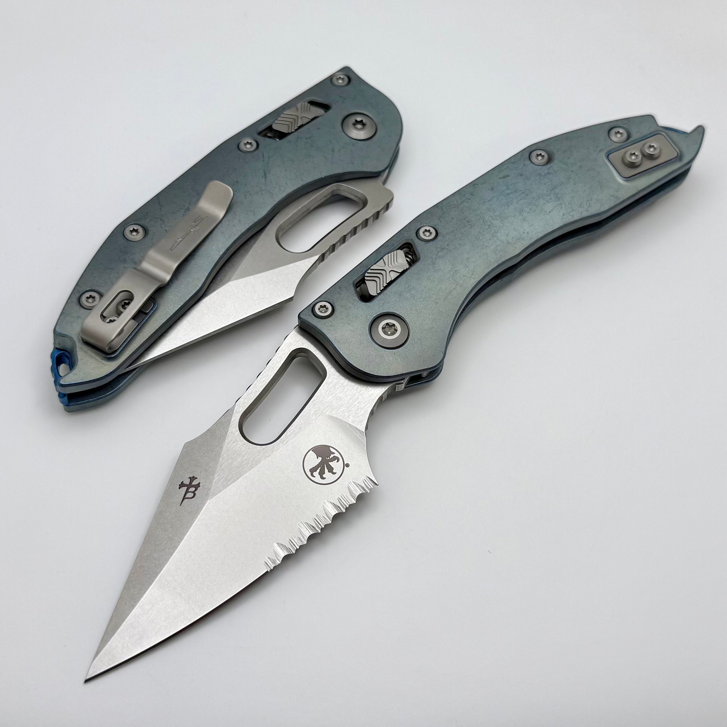 Microtech Marfione Select Manual Stitch RAM LOK Ice Blue Titanium Hand